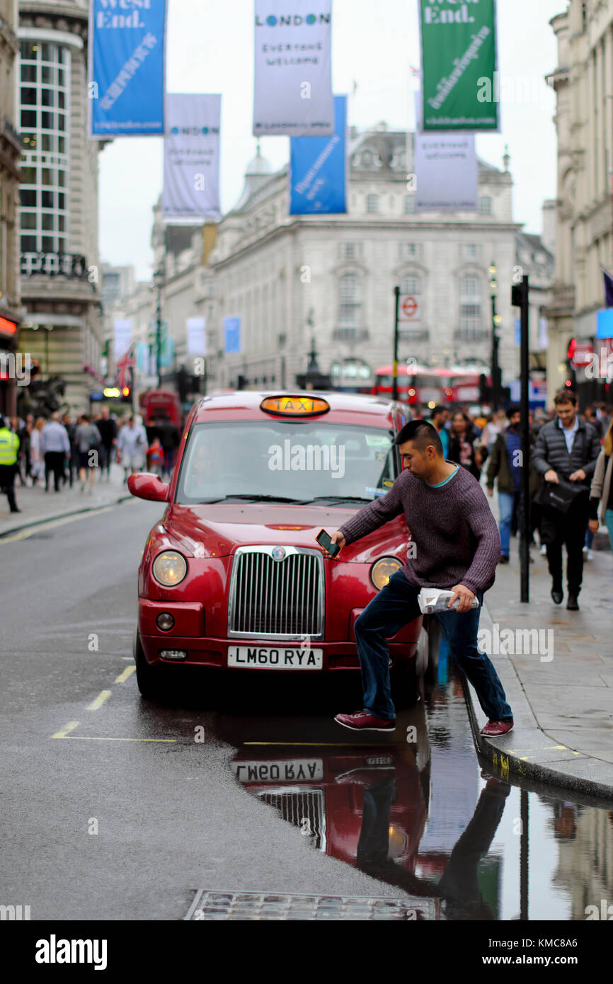 Man leaping over puddle hi-res stock photography and images - Alamy