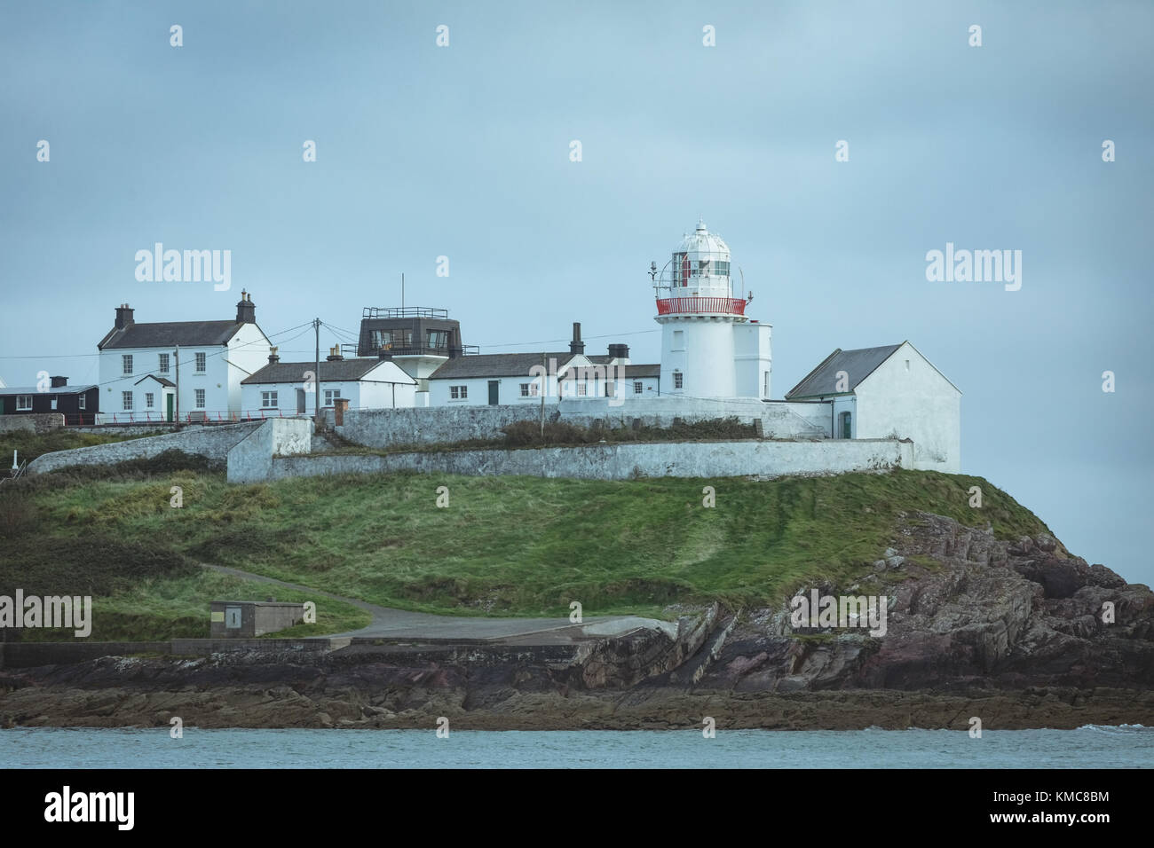 Lighthouse on cliff Stock Photo - Alamy