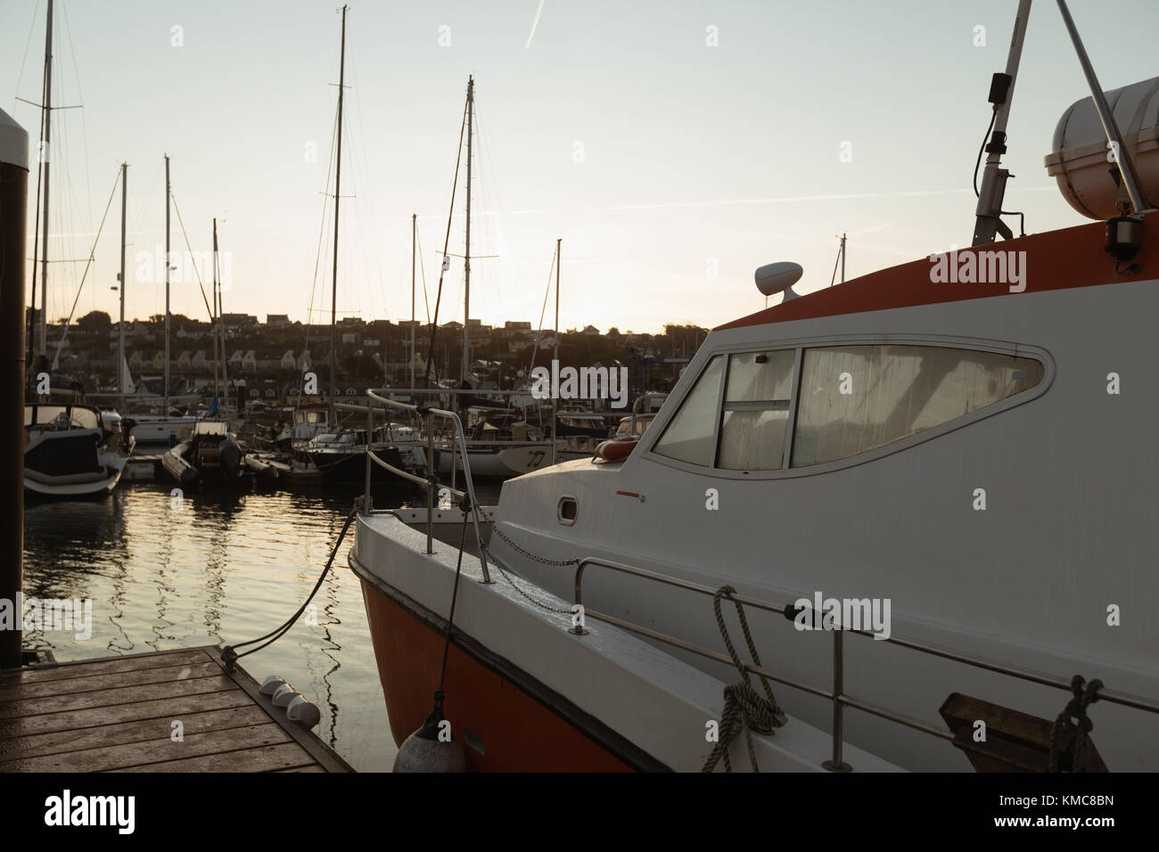 Moored boat at harbor Stock Photo - Alamy
