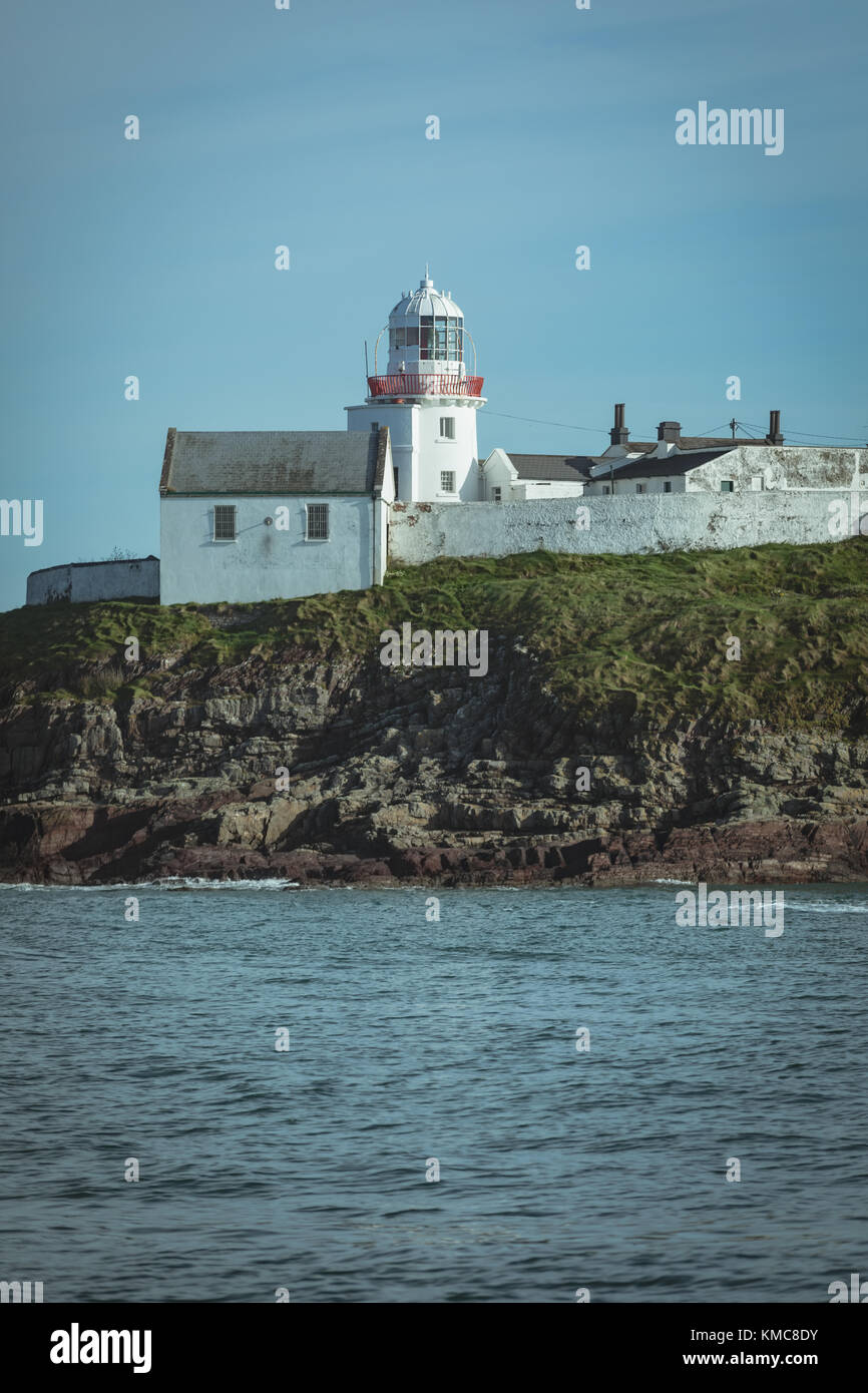 Lighthouse on cliff Stock Photo - Alamy