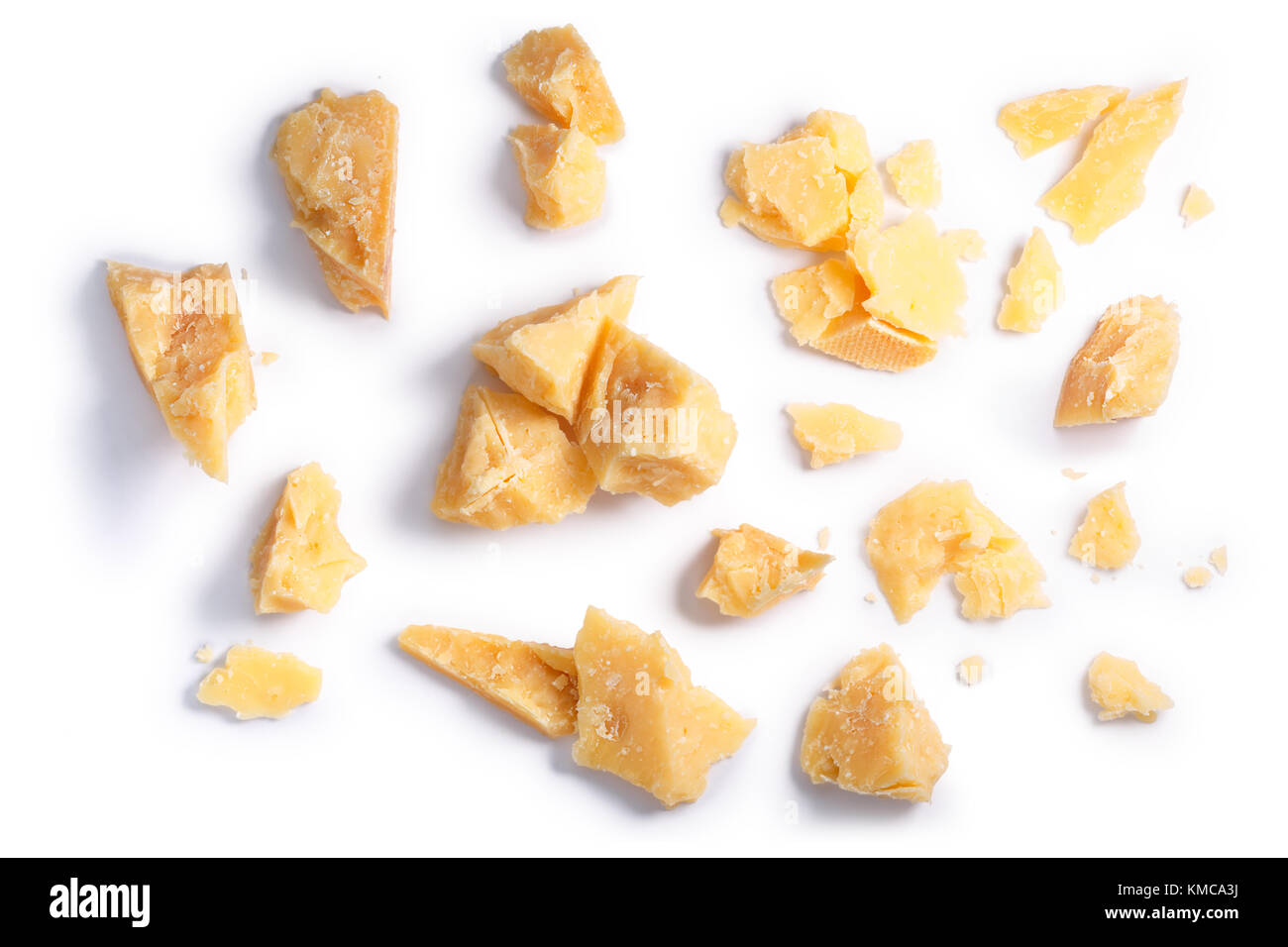 Hard mature cheese (Parmesan, Parmigiano), rough pieces, piles, crumbs ...