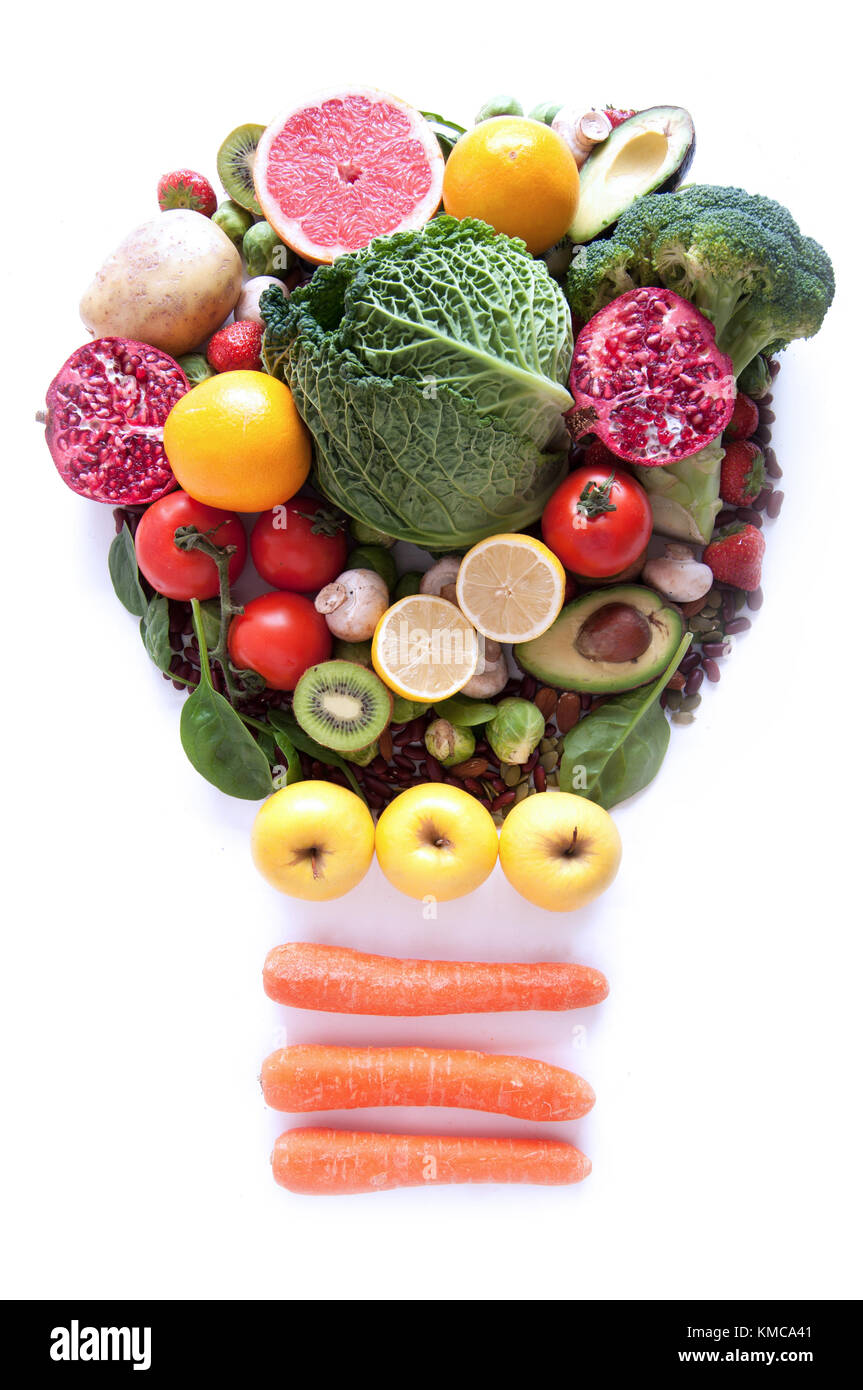 Light bulb made of fruits and vegetables over a white background Stock ...