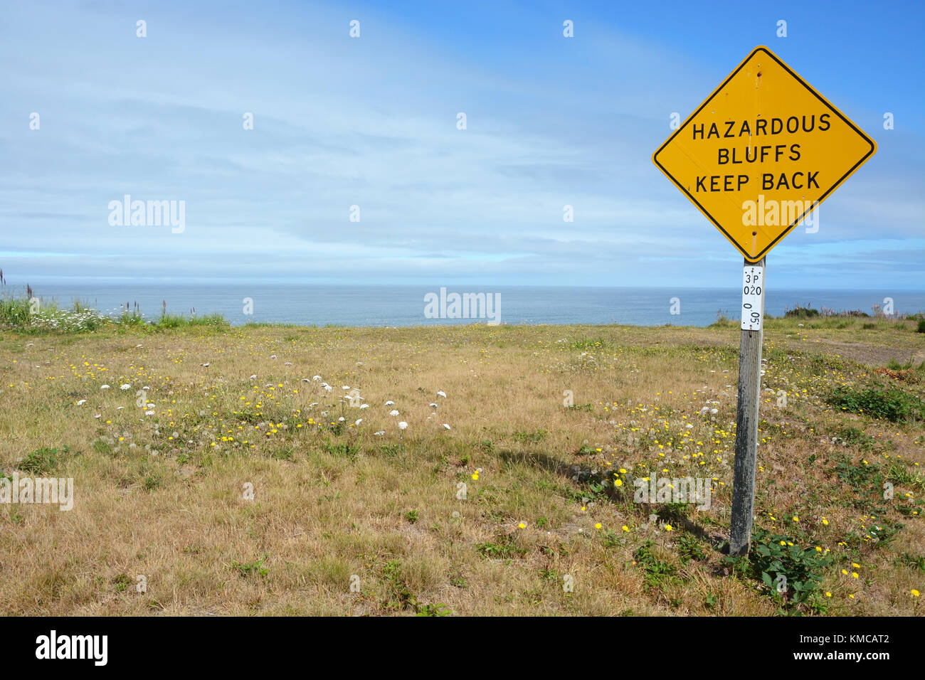 Sign on the Pacific ocean shore Stock Photo - Alamy
