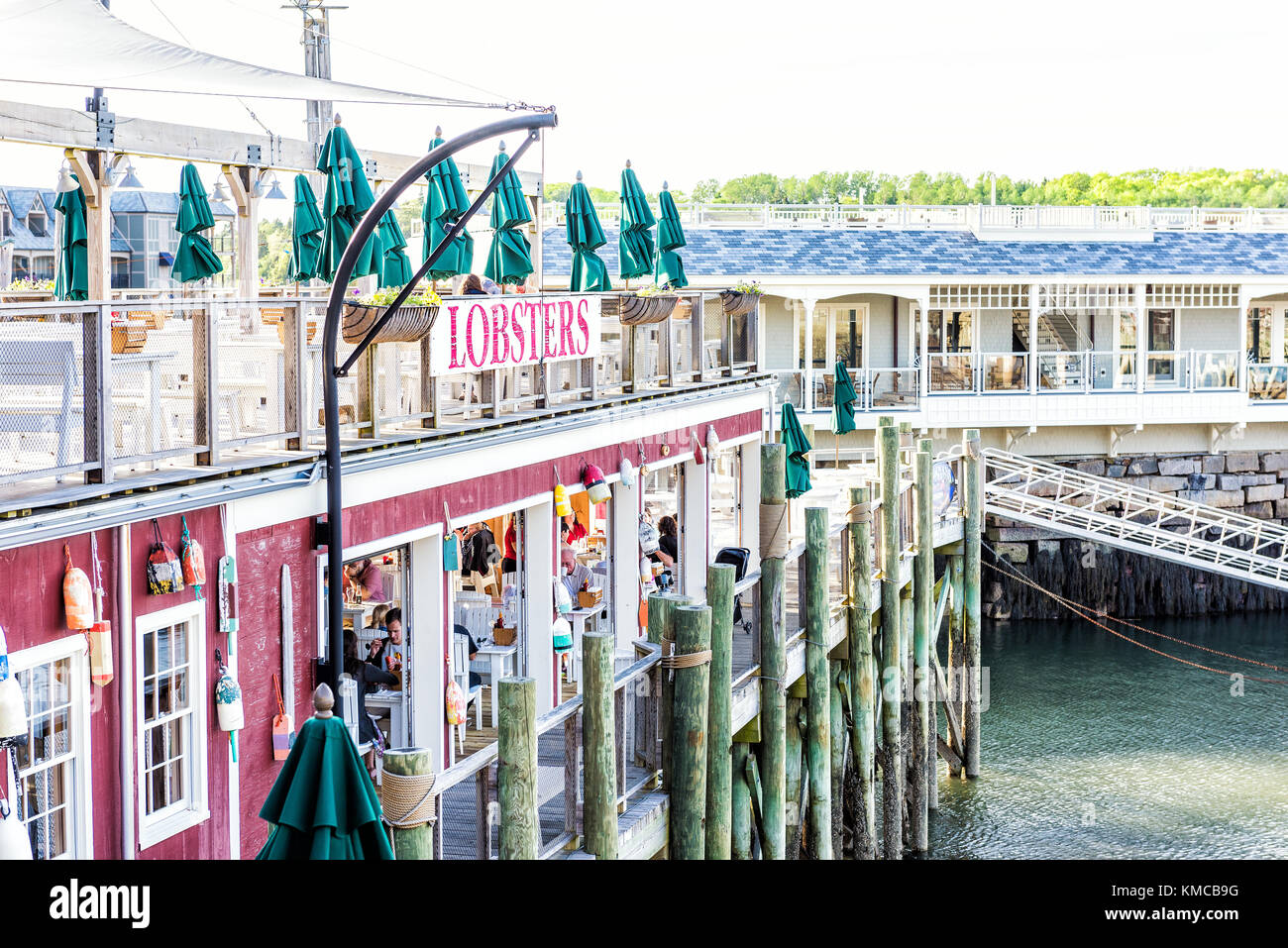 Bar Harbor, USA - June 8, 2017: Wooden deck dock, marina and waterfront ...
