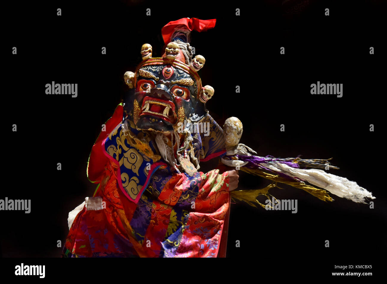 Buddhist monk in the ancient mask Palden Lhamo performs the Tsam Dance ...