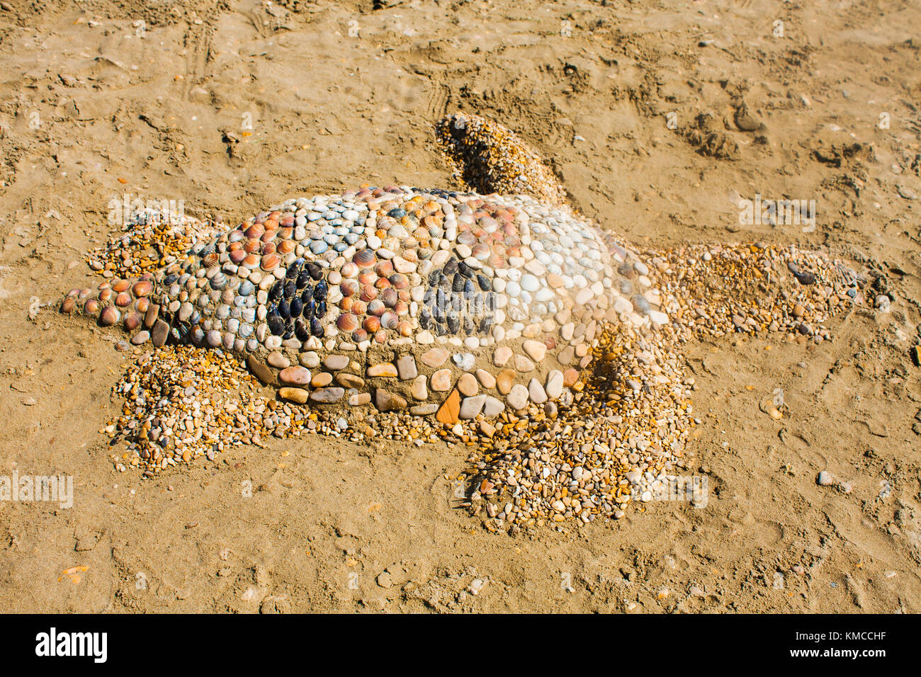 Sea turtle made of sand on the beach, Adriatic Seacoast view Stock ...