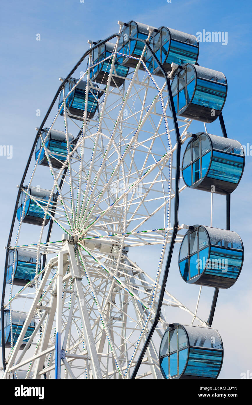 Modern blue ferris Wheel on Blue Sky Stock Photo - Alamy