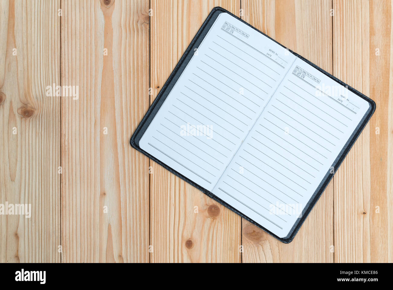 Notebook on wood table top view with copy space, menu mockup Stock ...