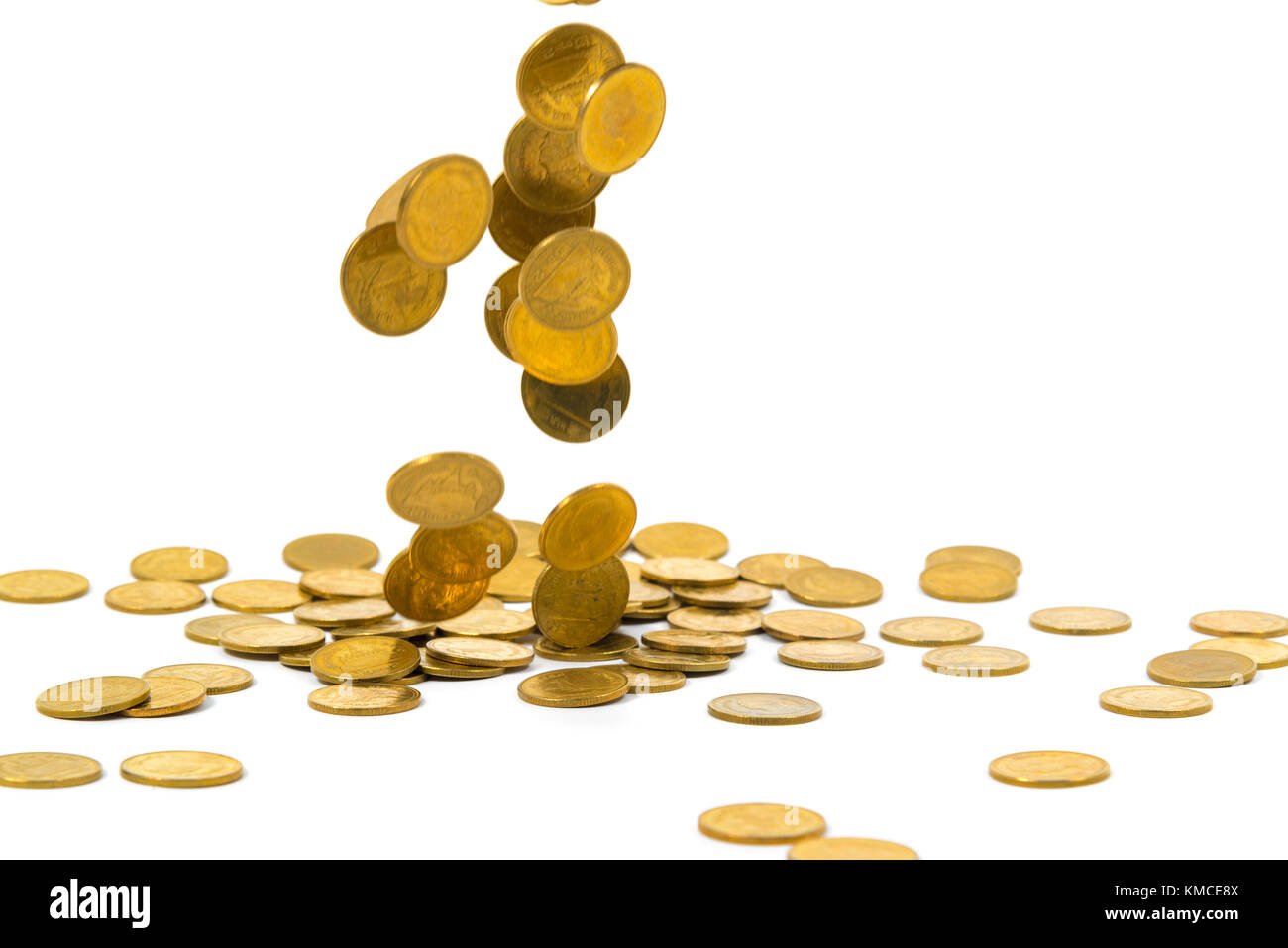 Falling gold coins money isolated on the white background, business ...