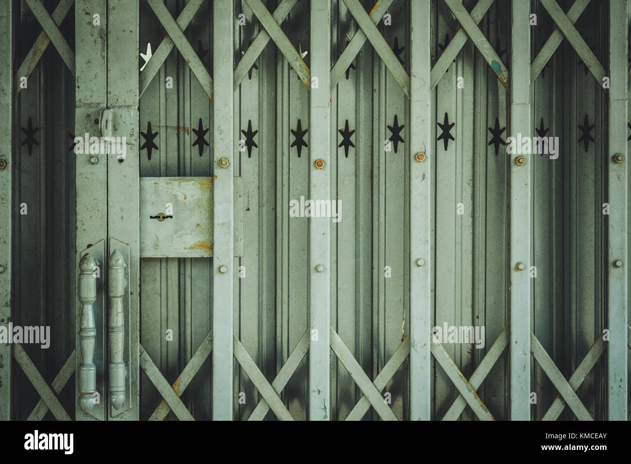 The rusty steel door with lock background in vintage tone Stock Photo ...