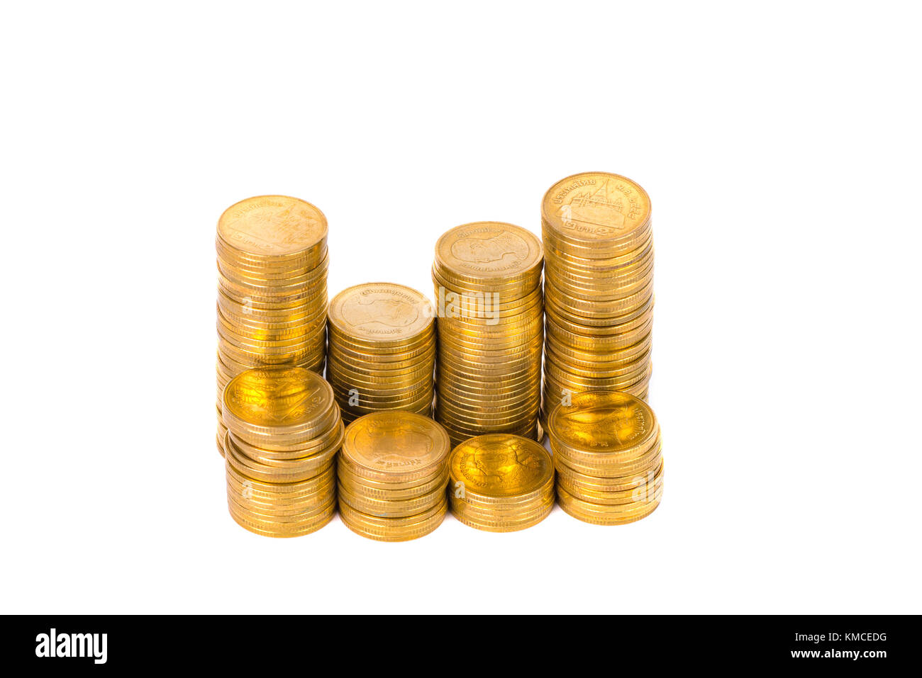 Columns of gold coins, piles of coins arranged on white background ...