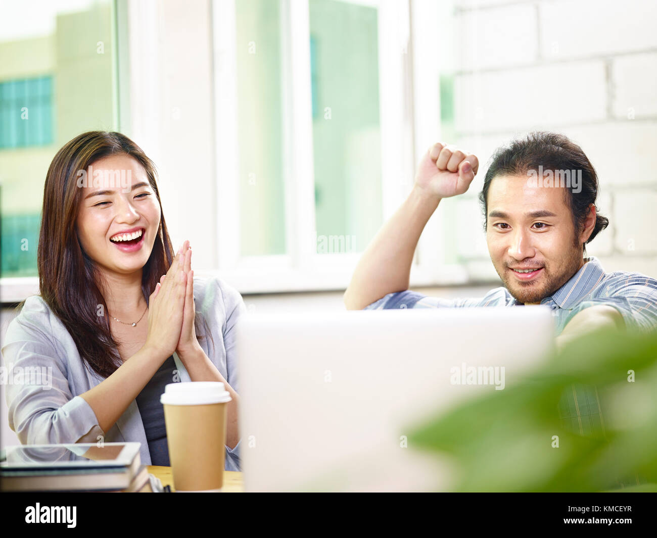 Celebrating achievement hi-res stock photography and images - Alamy