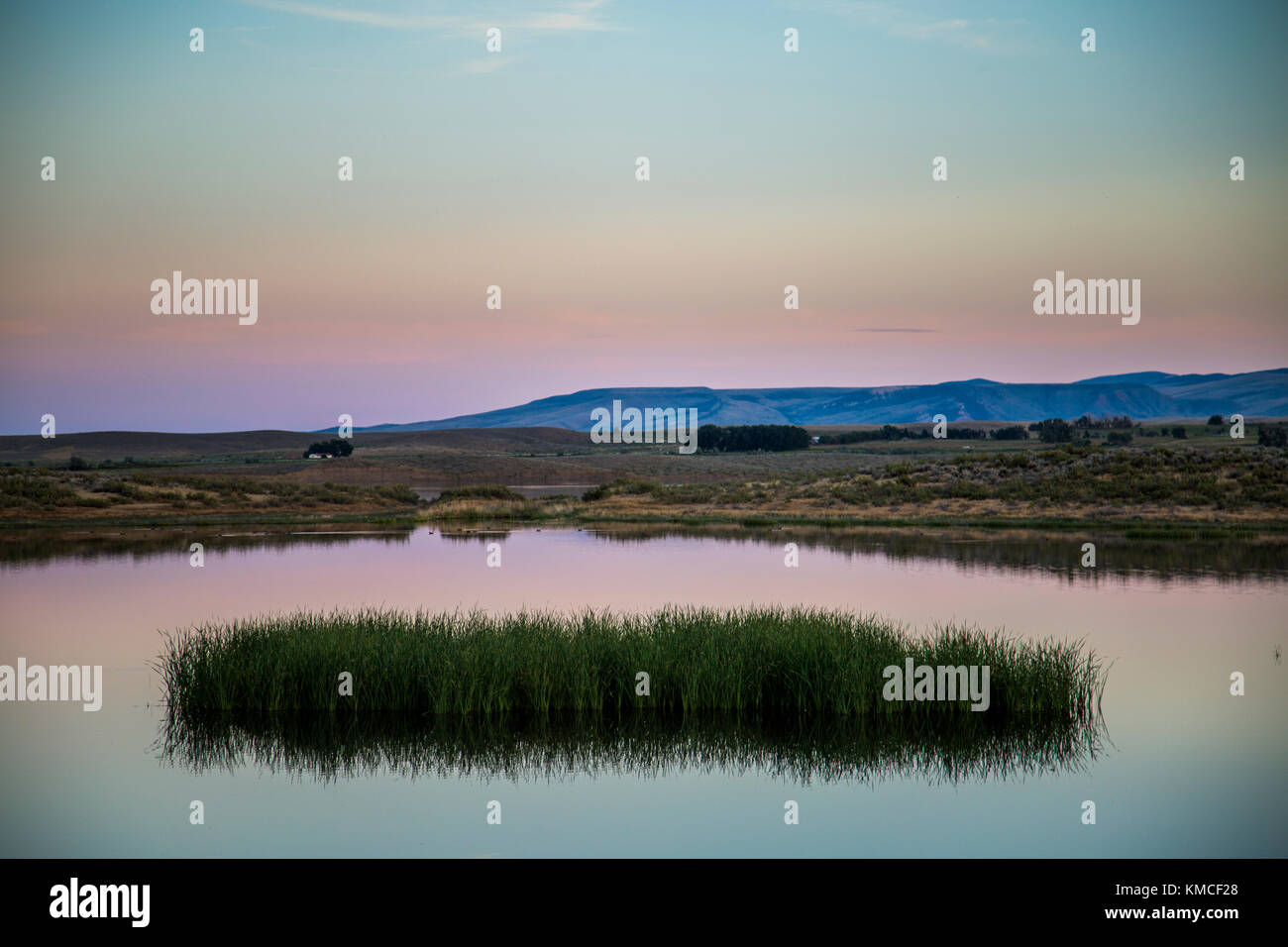A boy and his father fish on Ray Lake, Wind River Indian Reservation ...