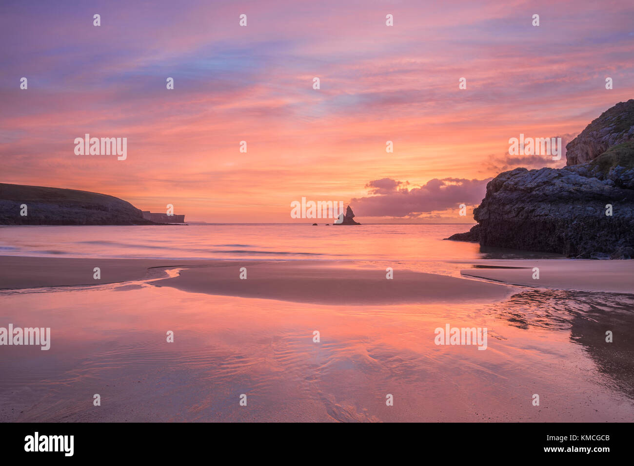 Stunning sunrise landsdcape of idyllic Broadhaven Bay beach on ...