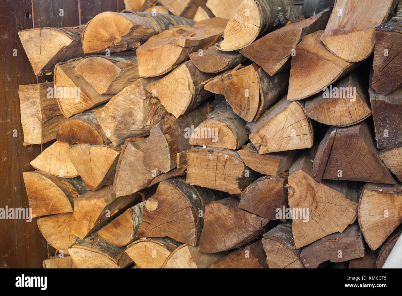 Woodpile of chopped lumber. Pile of wood logs. Stacked firewood timber ...