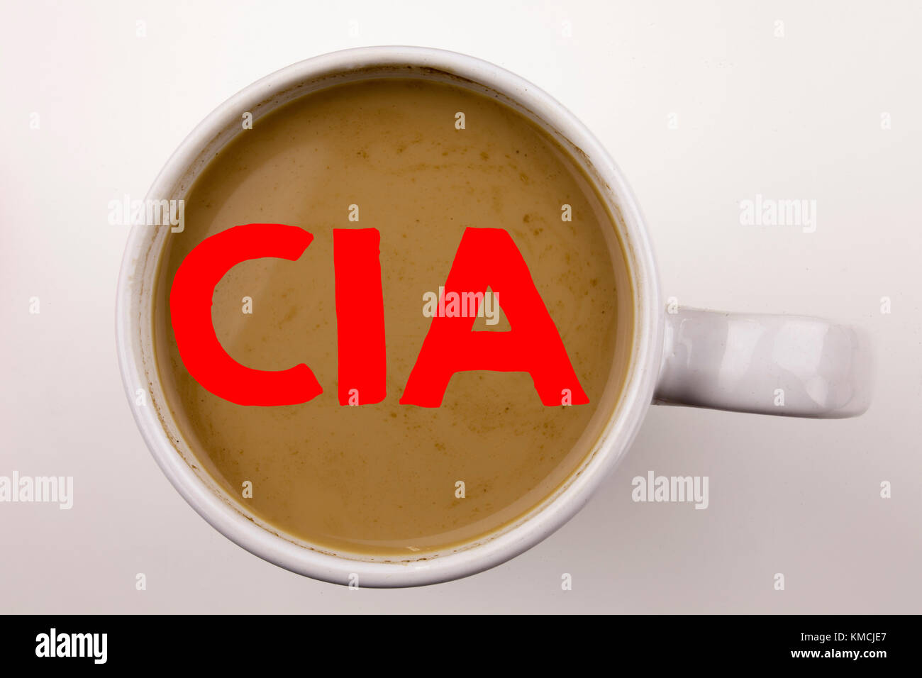 Word, writing CIA text in coffee in cup. Business concept for ...