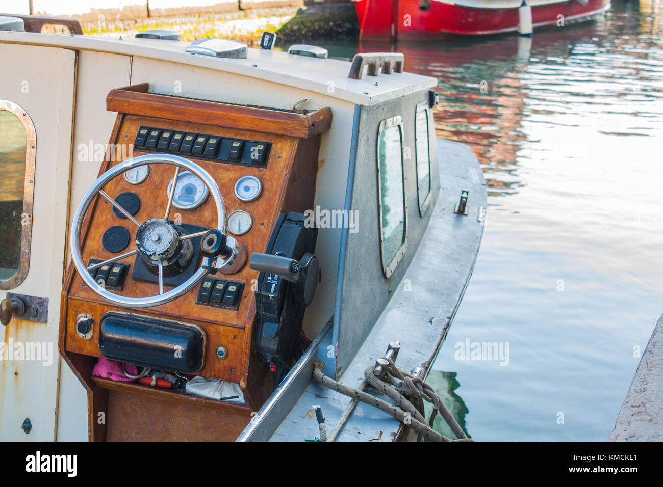 Helm of a boat, vintage wooden navigation panel with steering wheel ...