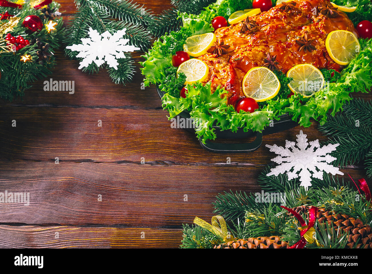 Christmas table dinner time with roasted meats decorated in Christmas ...