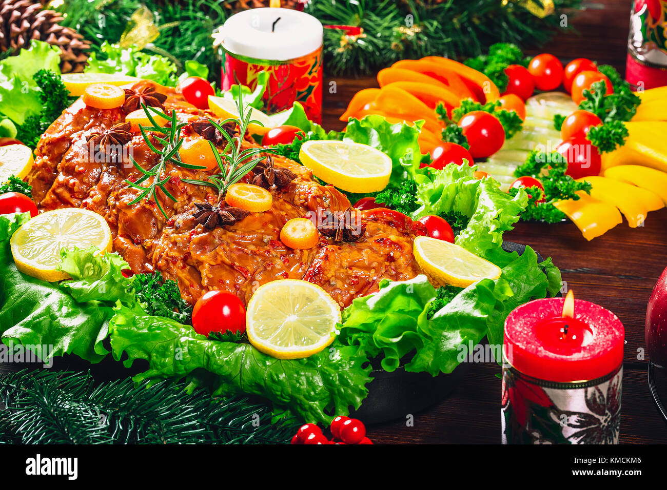 Christmas table dinner time with roasted meats decorated in Christmas ...
