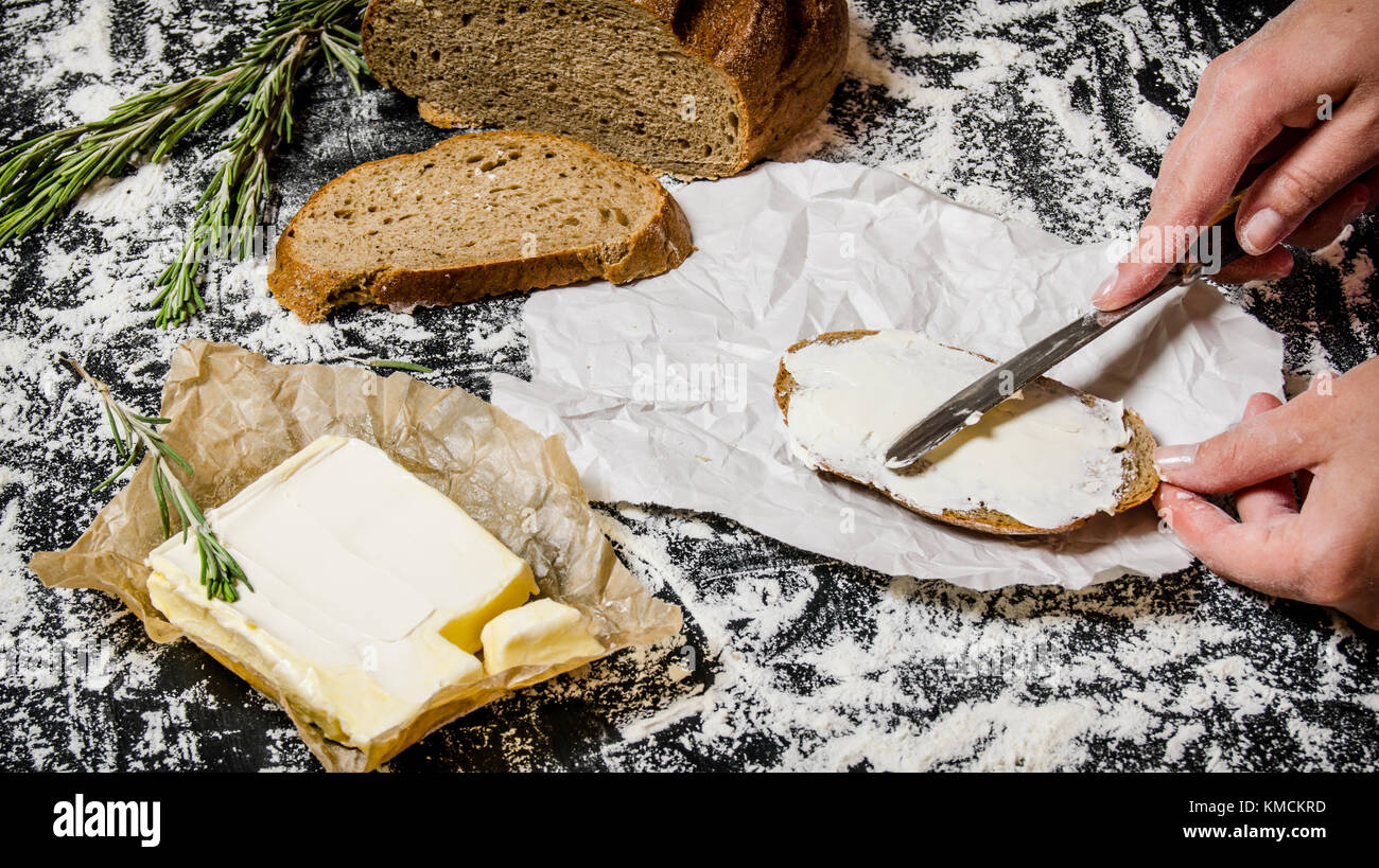 Woman buttering toast hi-res stock photography and images - Alamy