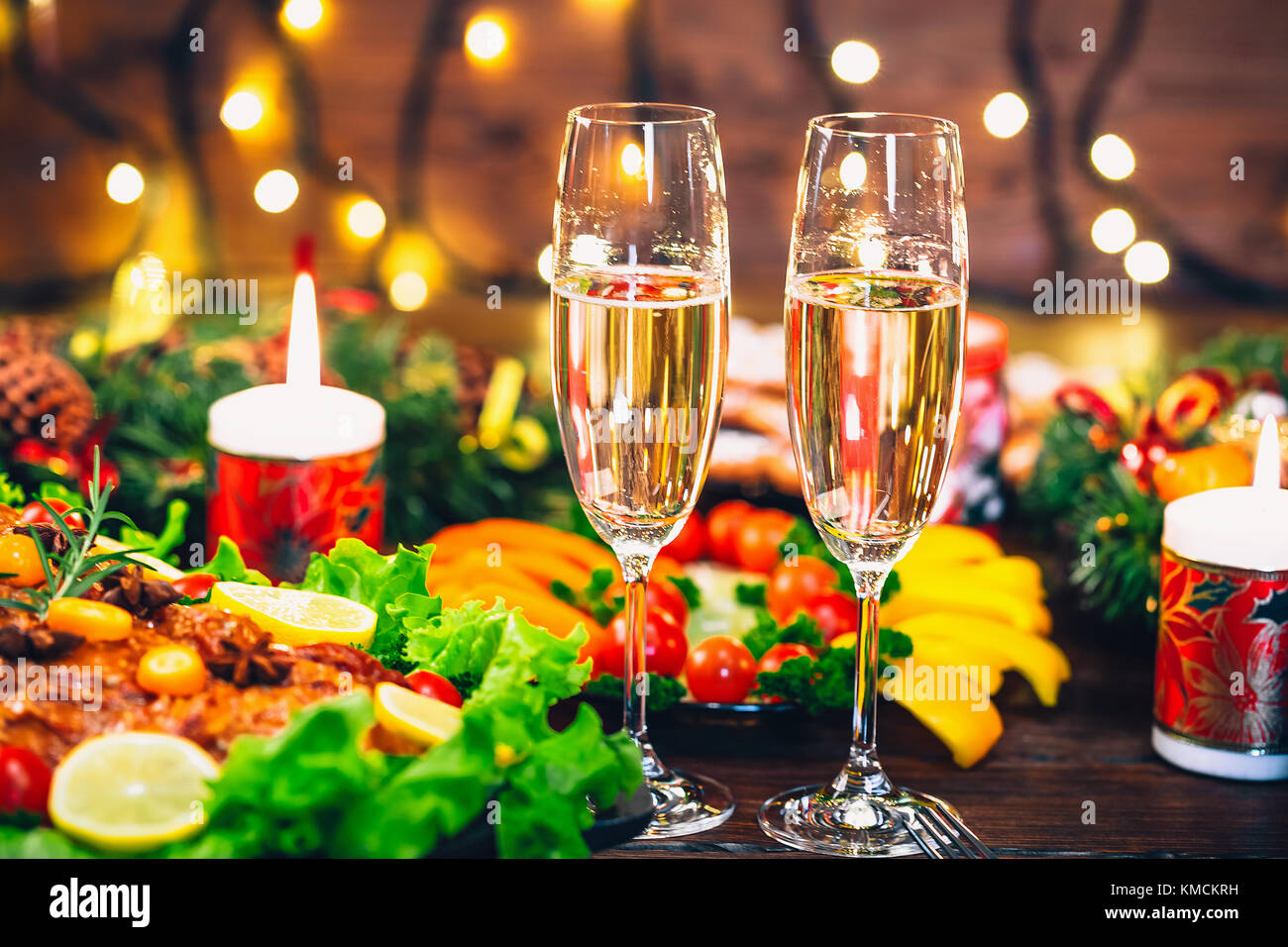 Christmas table dinner time with roasted meats decorated in Christmas ...