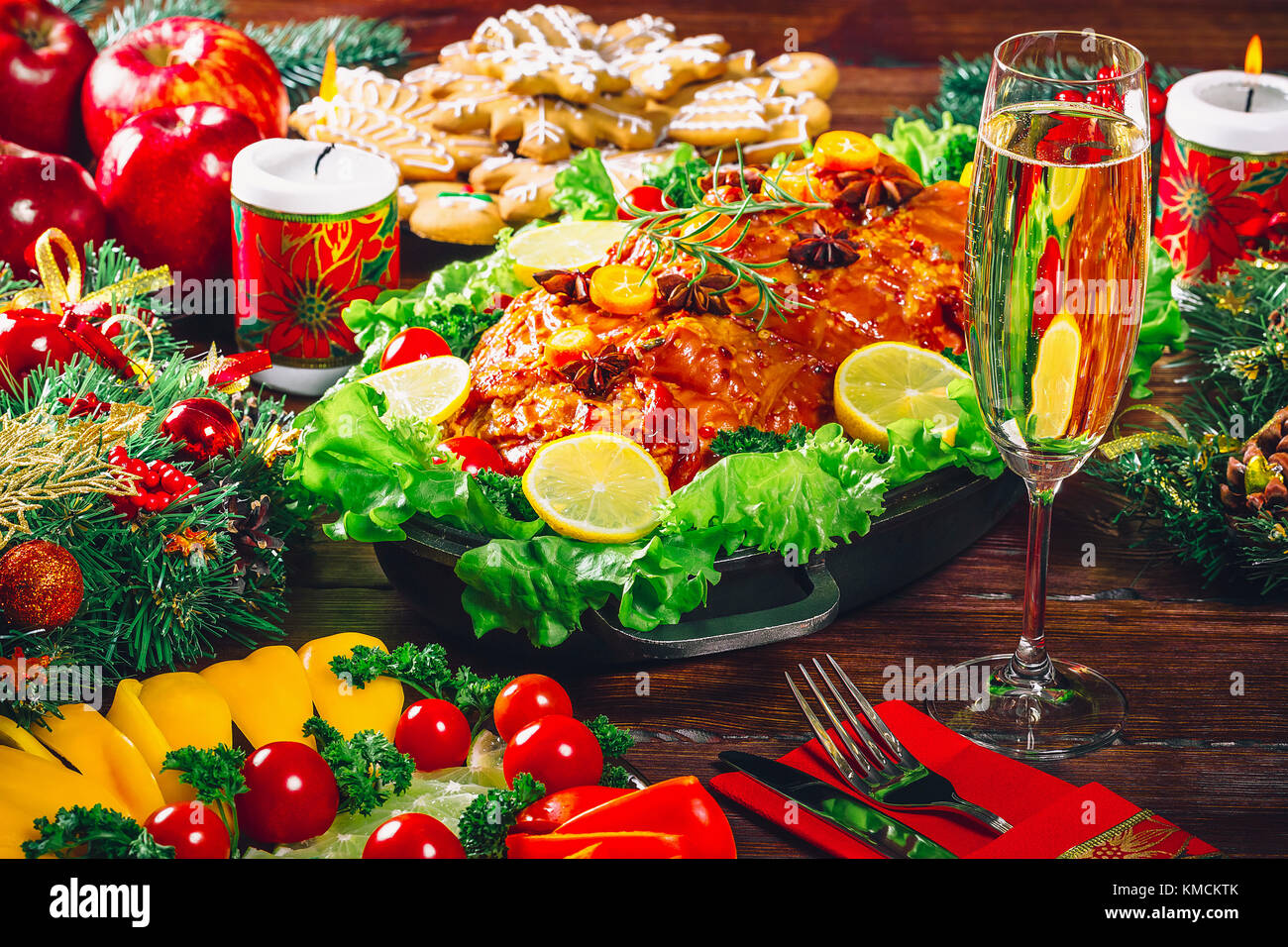 Christmas table dinner time with roasted meats decorated in Christmas ...