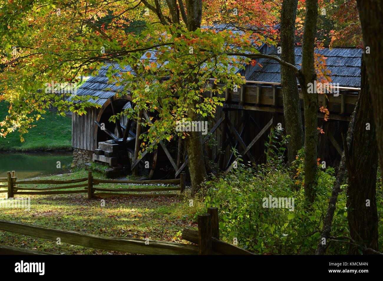 Historic Mabry Mill hidden amongst the colorful trees of Autumn along ...