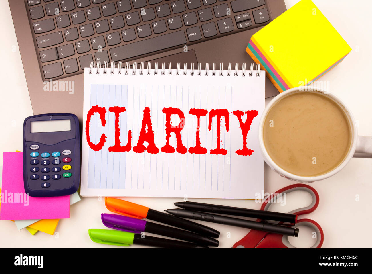 Word writing Clarity in the office with laptop, marker, pen, stationery ...