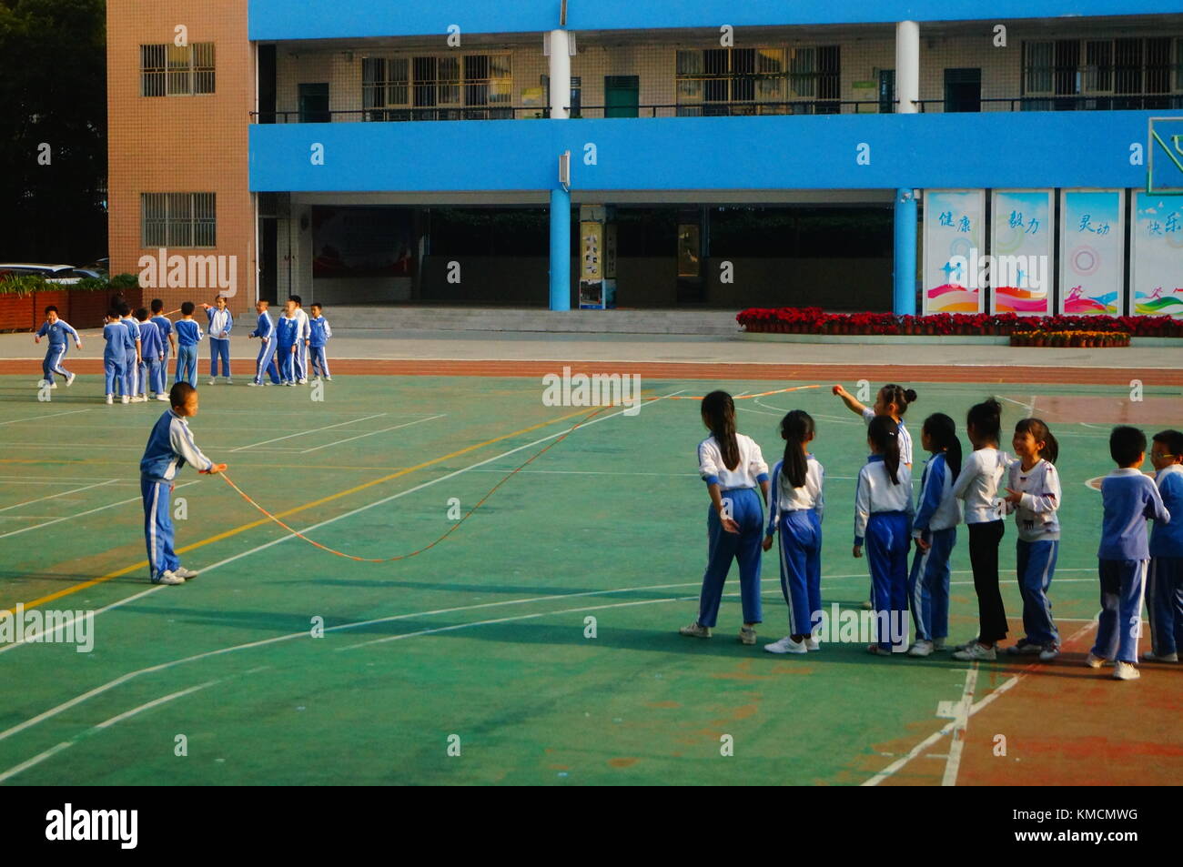 In the primary school playground, primary school students are taking ...
