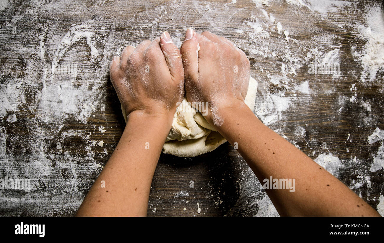 Preparation of the dough. Preparation of the dough the women's hands ...