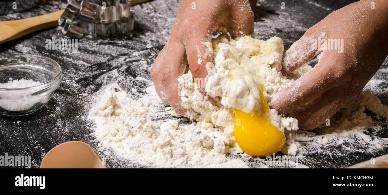 Preparation of the dough . Preparation of the dough the women's hands ...
