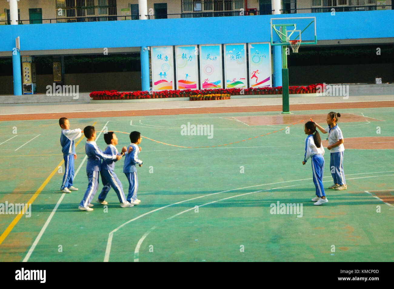 In the primary school playground, primary school students are taking ...