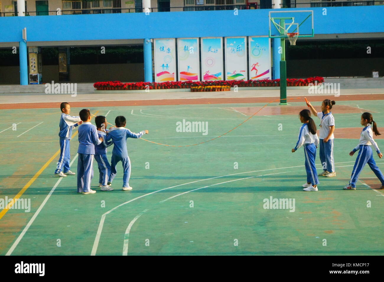 In the primary school playground, primary school students are taking ...