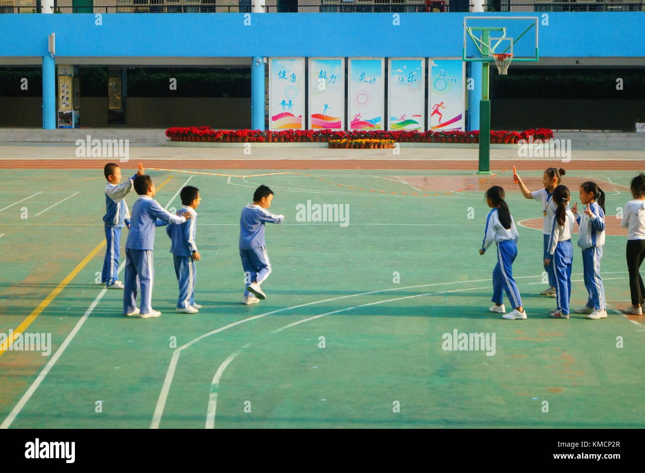 In the primary school playground, primary school students are taking ...