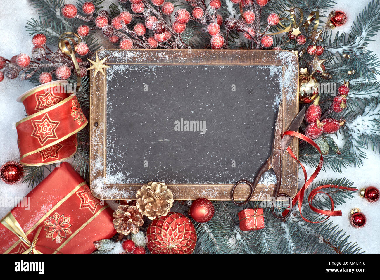 Blackboard with space for your greeting text with Christmas decorations ...