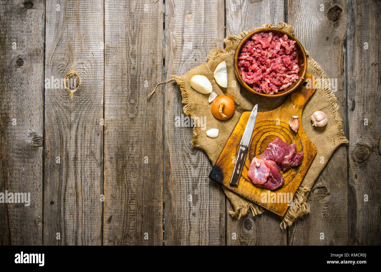 Prepatared of meat. The preparation of minced meat and onions on the ...