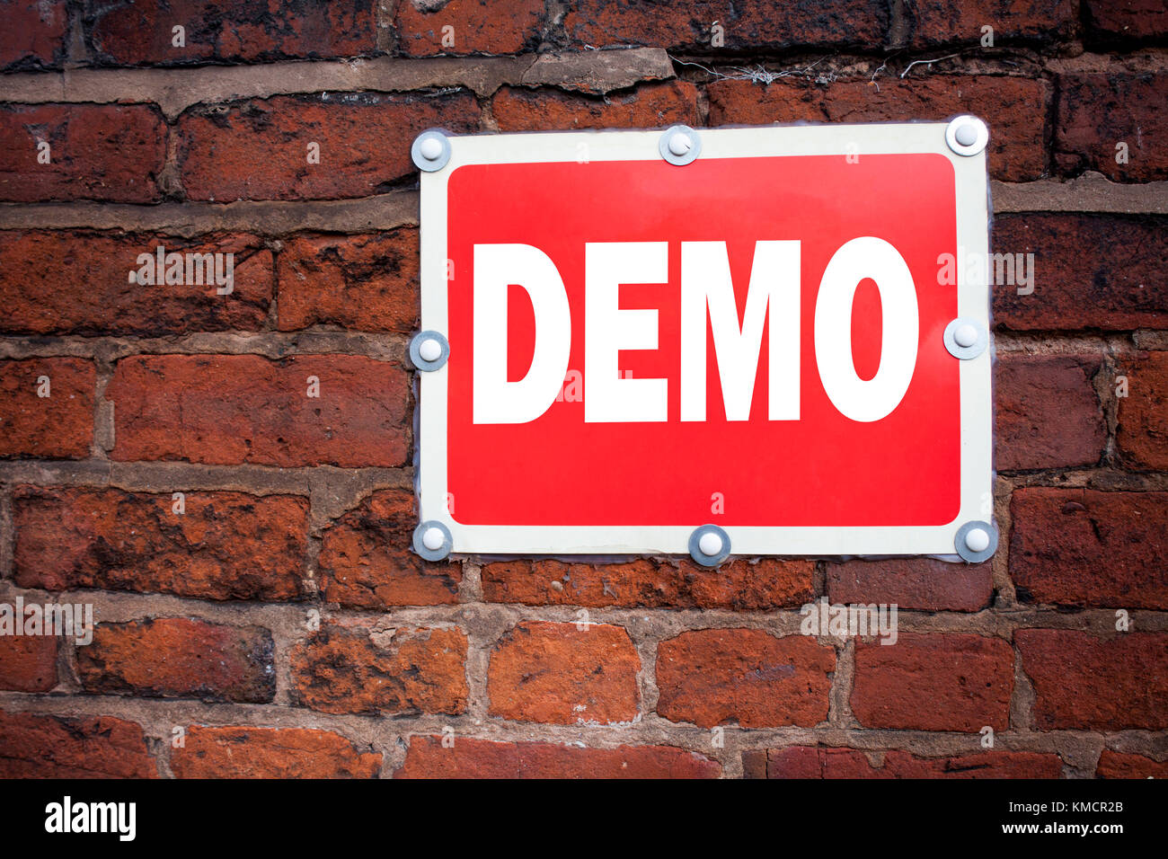 Hand writing text caption inspiration showing Demo concept meaning ...