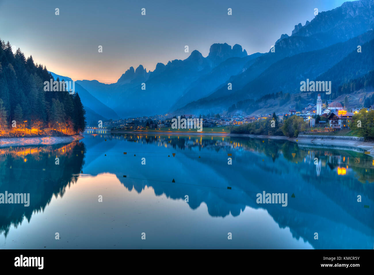 The Italian town of Auronzo di Cadore with reflections in Santa ...