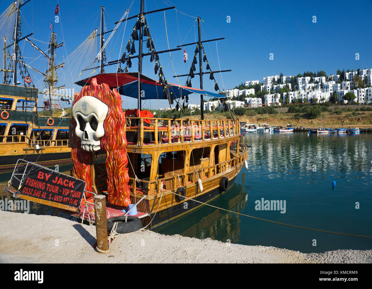 Excursion boats decorated as pirate boats at a small harbour, Avsallar ...