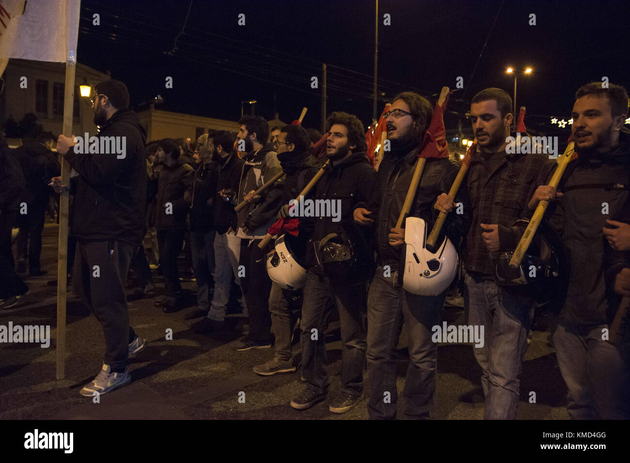 Athens, Greece. 6th Dec, 2017. Protesters march shouting slogans ...