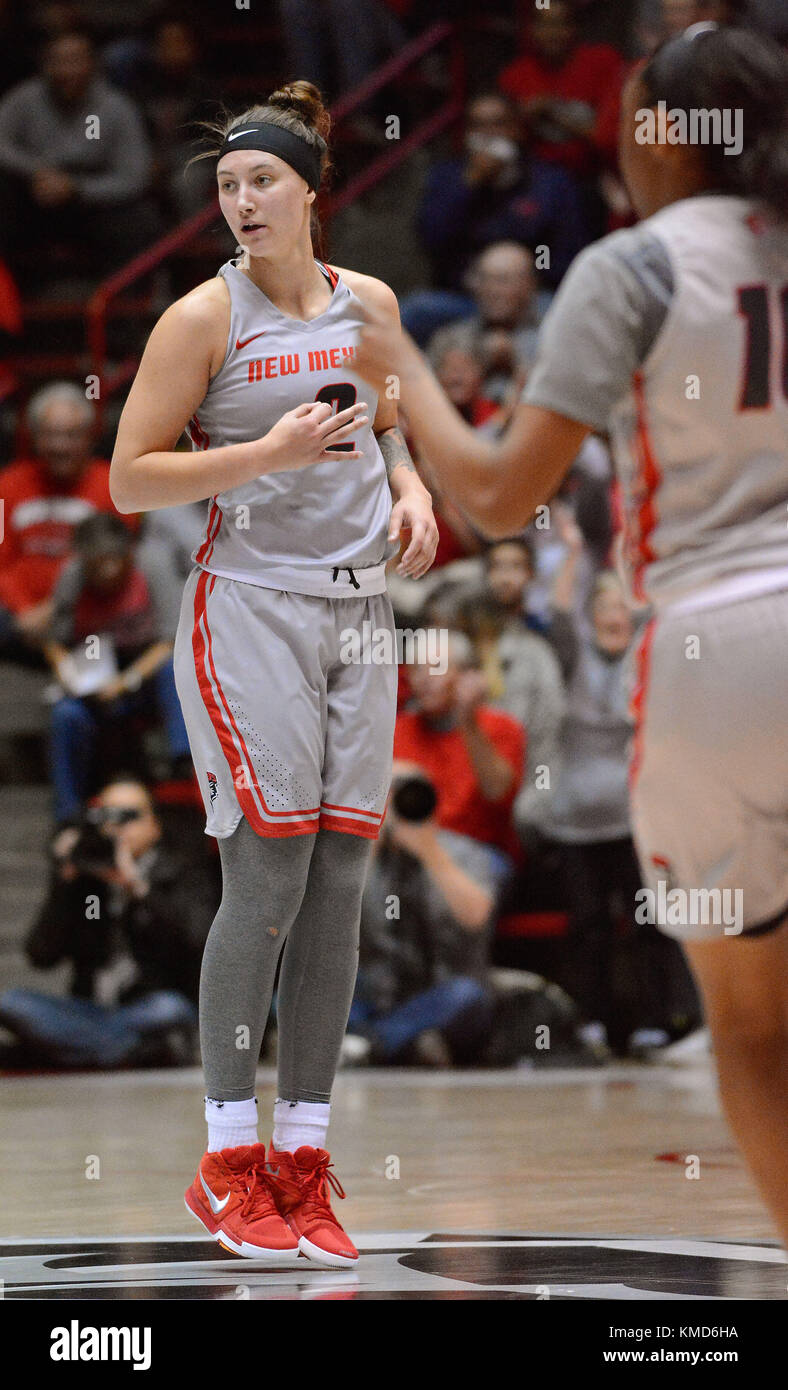 Albuquerque, NM, USA. 6th Dec, 2017. UNM's #2 Tesha Buck signals the ...