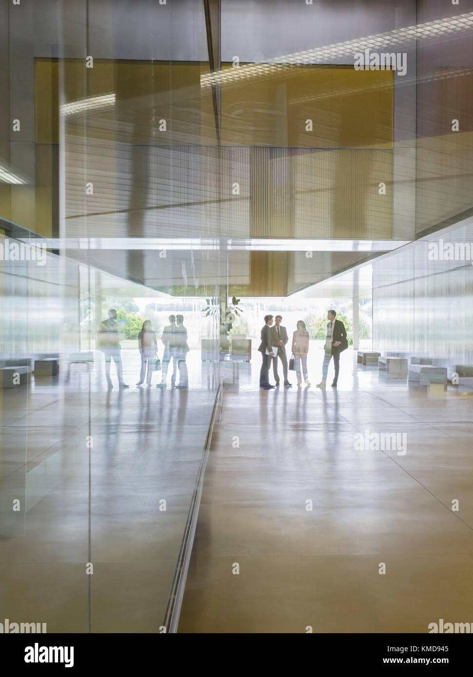 Four business people standing together hi-res stock photography and ...
