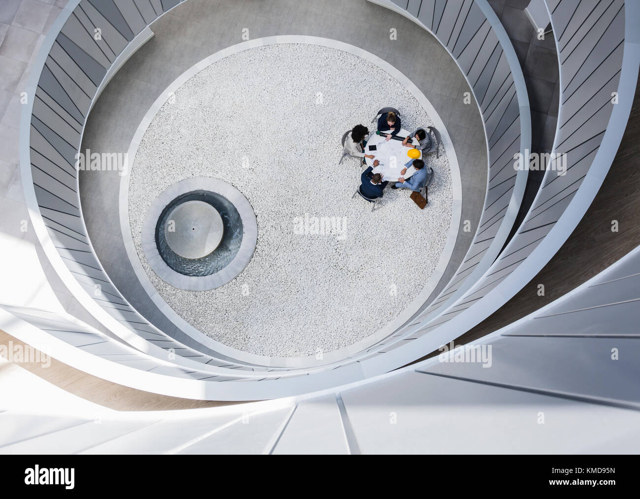 Group people sitting round table hi-res stock photography and images ...