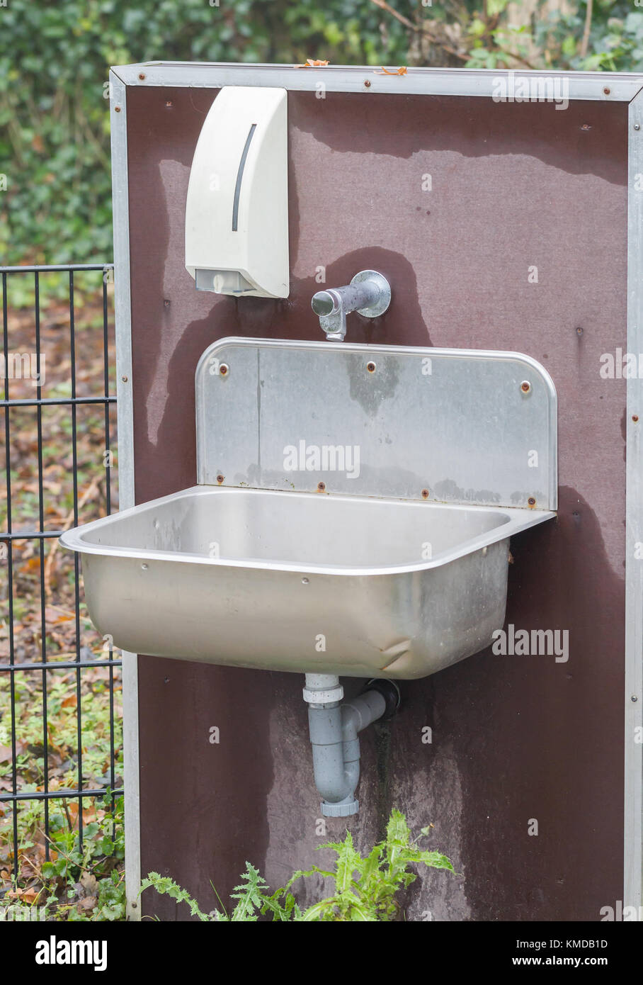 Metal sink outside - Washing your hands with soap Stock Photo - Alamy