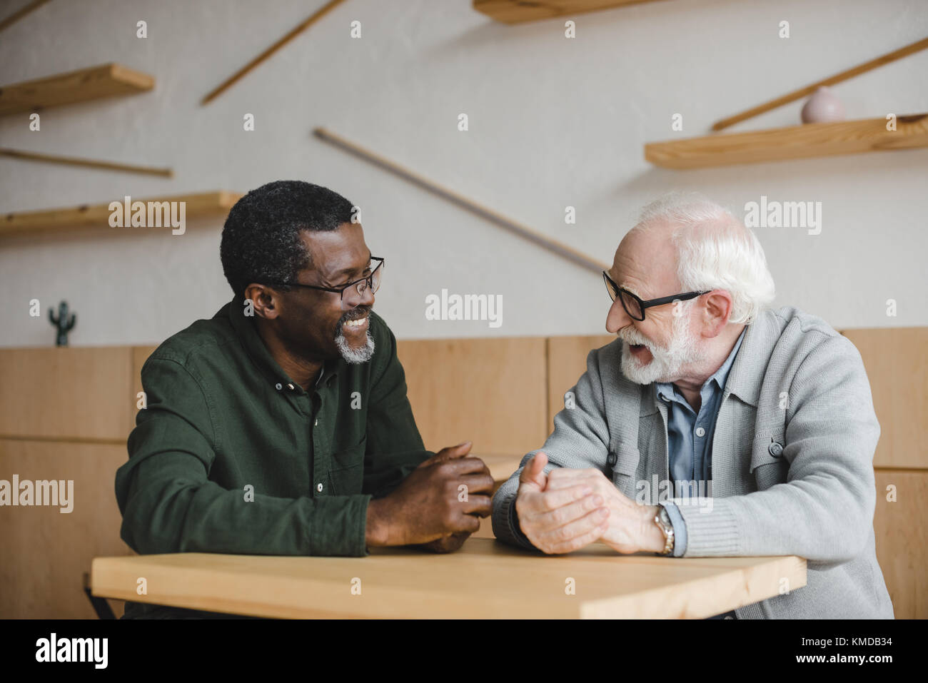 senior friends having discussion Stock Photo - Alamy