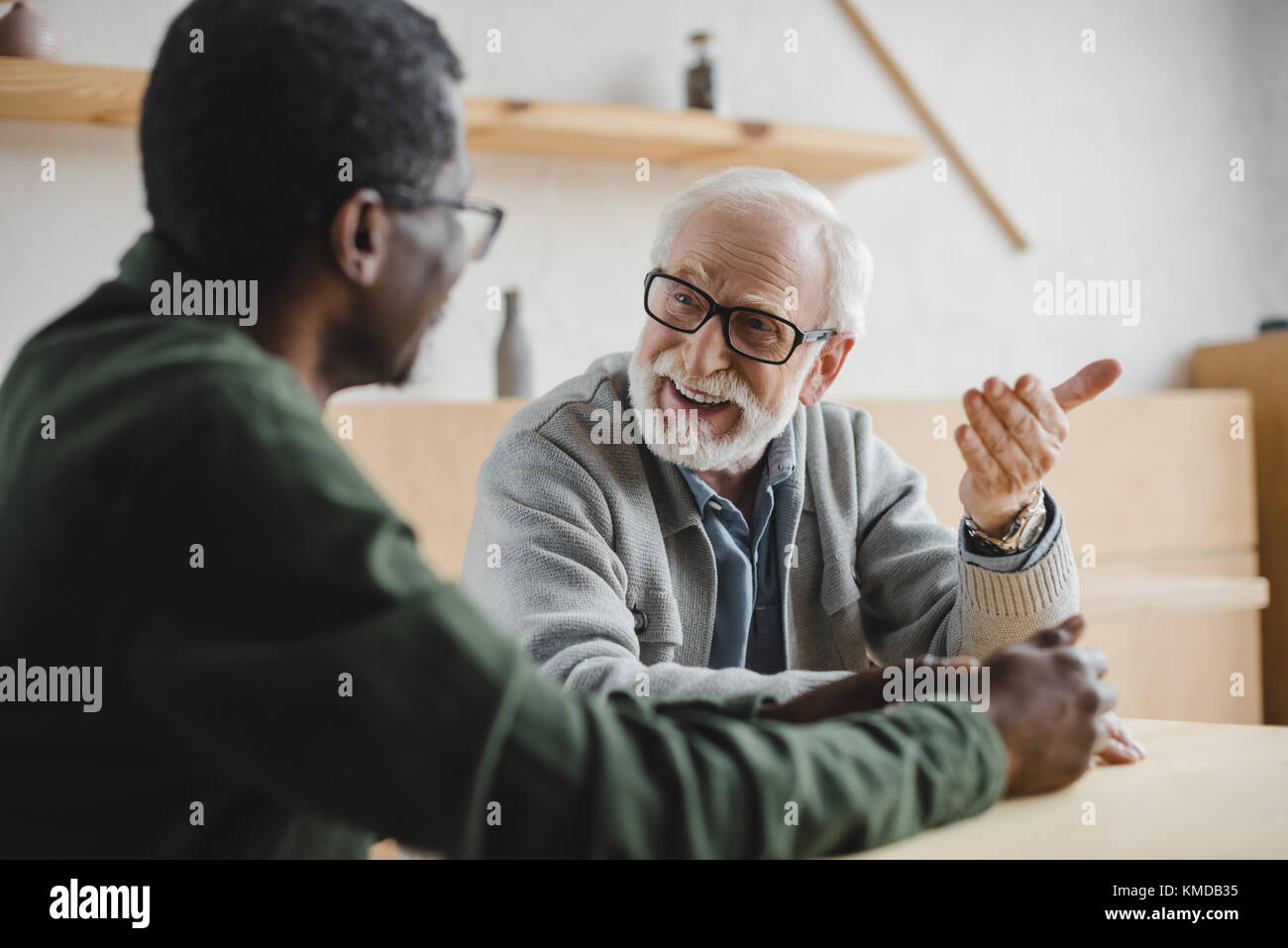 senior friends having discussion Stock Photo - Alamy