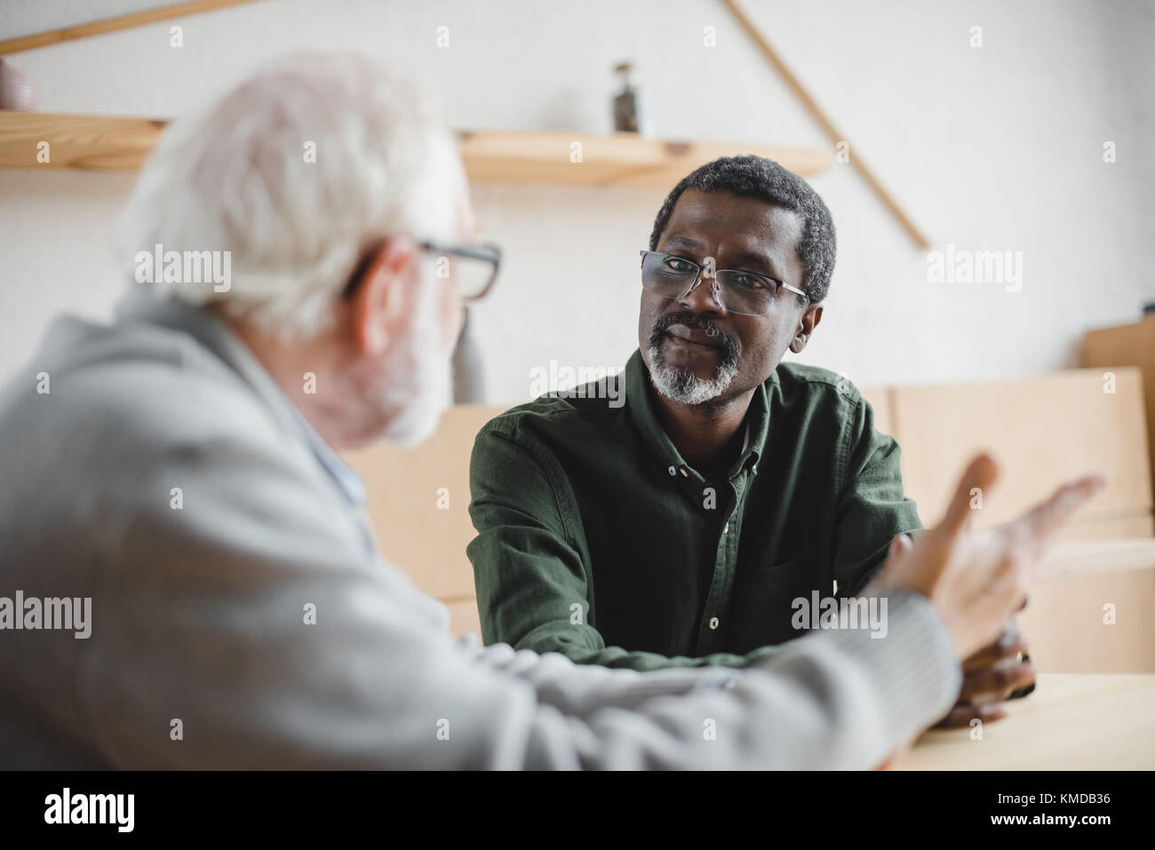 senior friends having discussion Stock Photo - Alamy