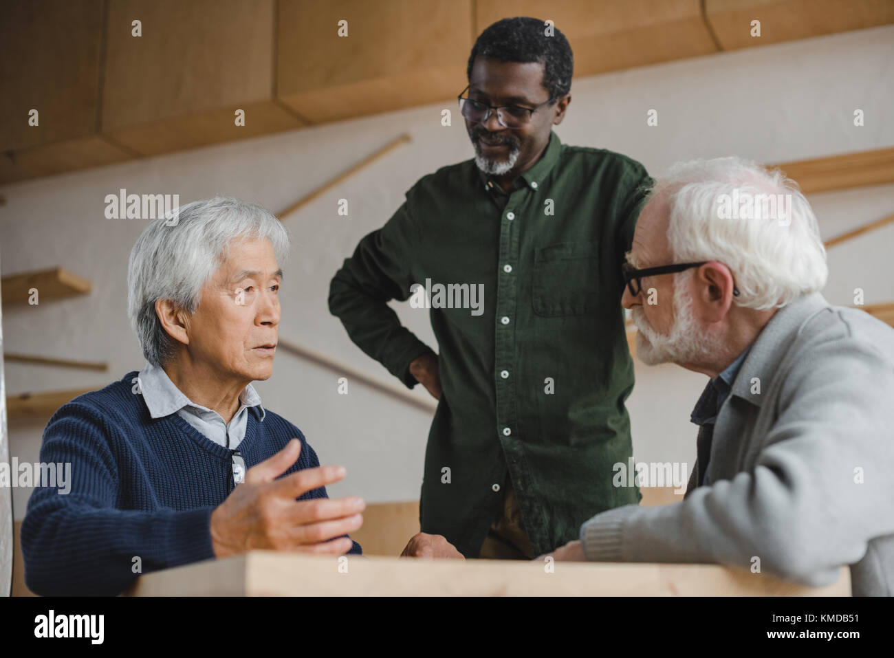 senior men talking in cafe Stock Photo - Alamy