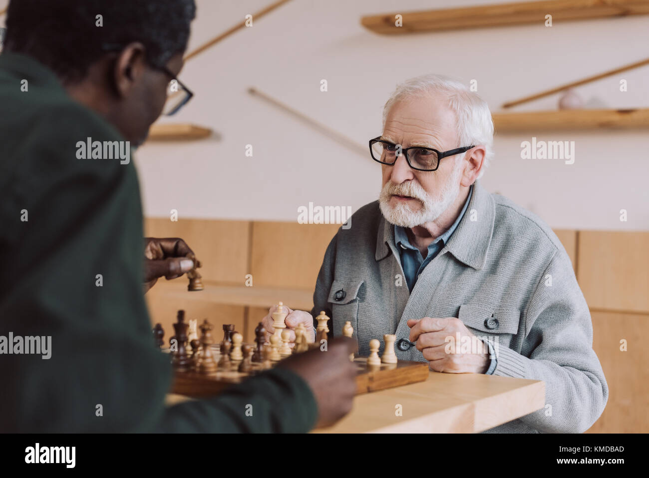senior men playing chess Stock Photo - Alamy