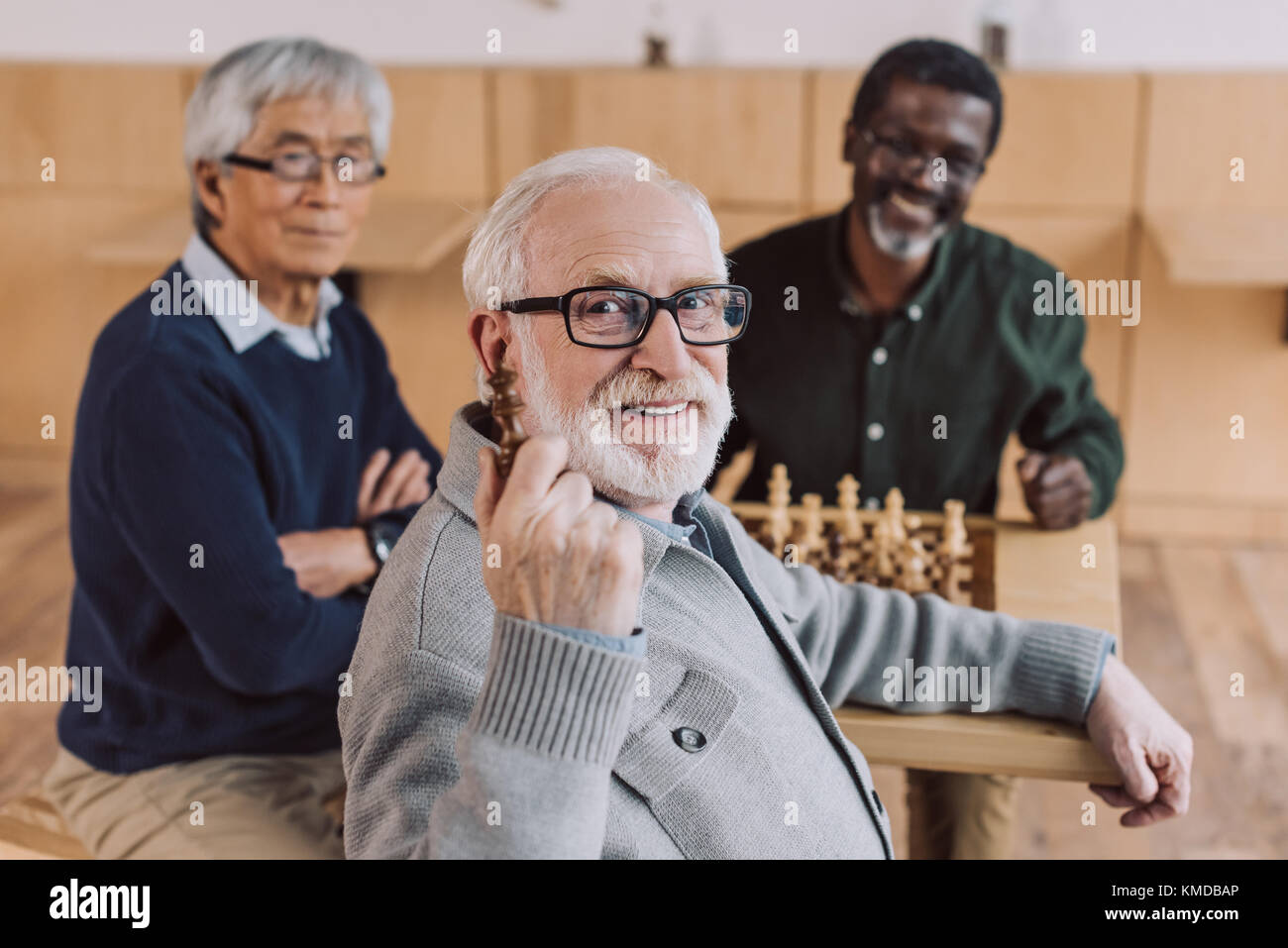 senior friends playing chess Stock Photo - Alamy